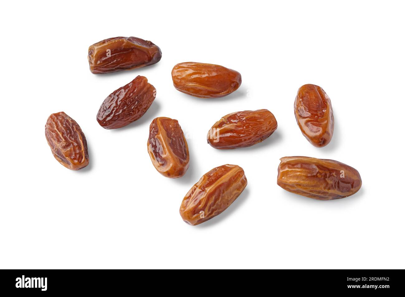 Dried dates on white background Stock Photo - Alamy