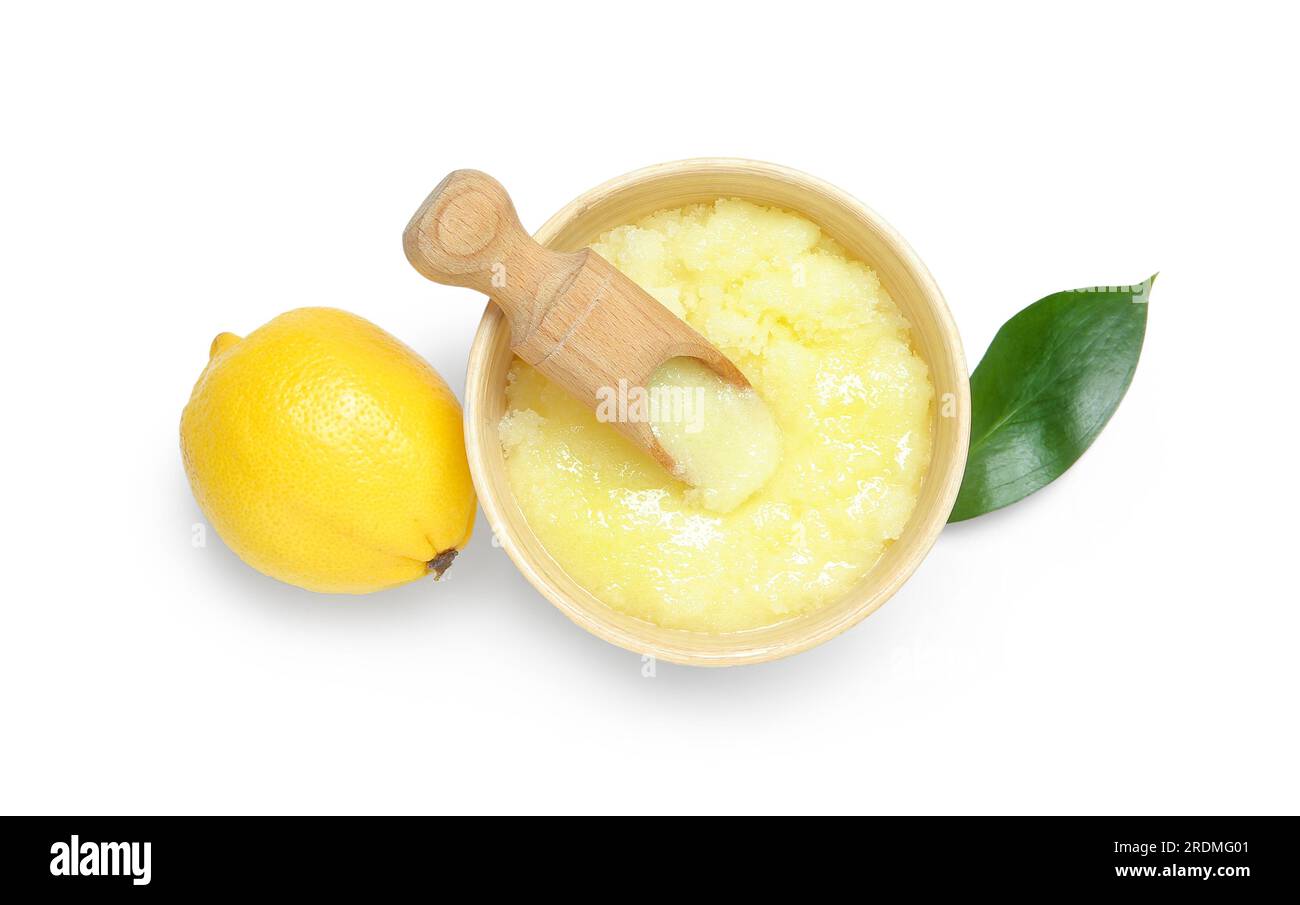 Bowl of lemon body scrub with scoop isolated on white background Stock ...