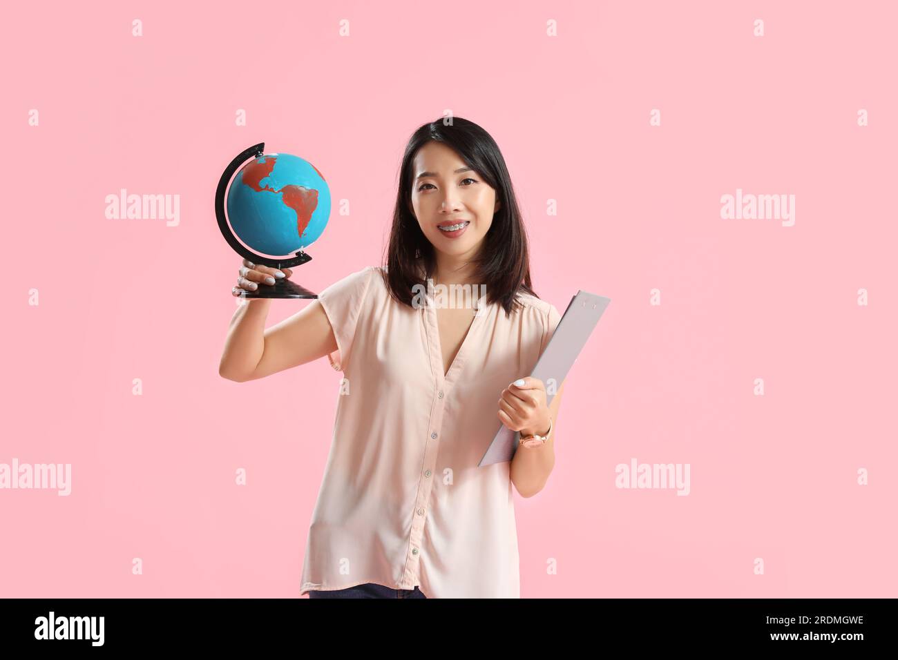 Female asian geography teacher hi-res stock photography and images - Alamy