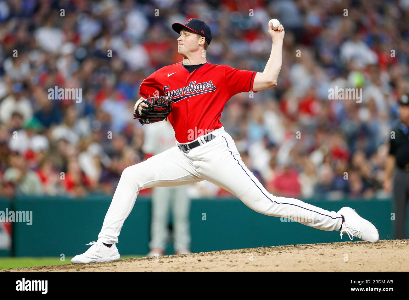 Cleveland Guardians relief pitcher Tim Herrin (29) throws to the plate ...