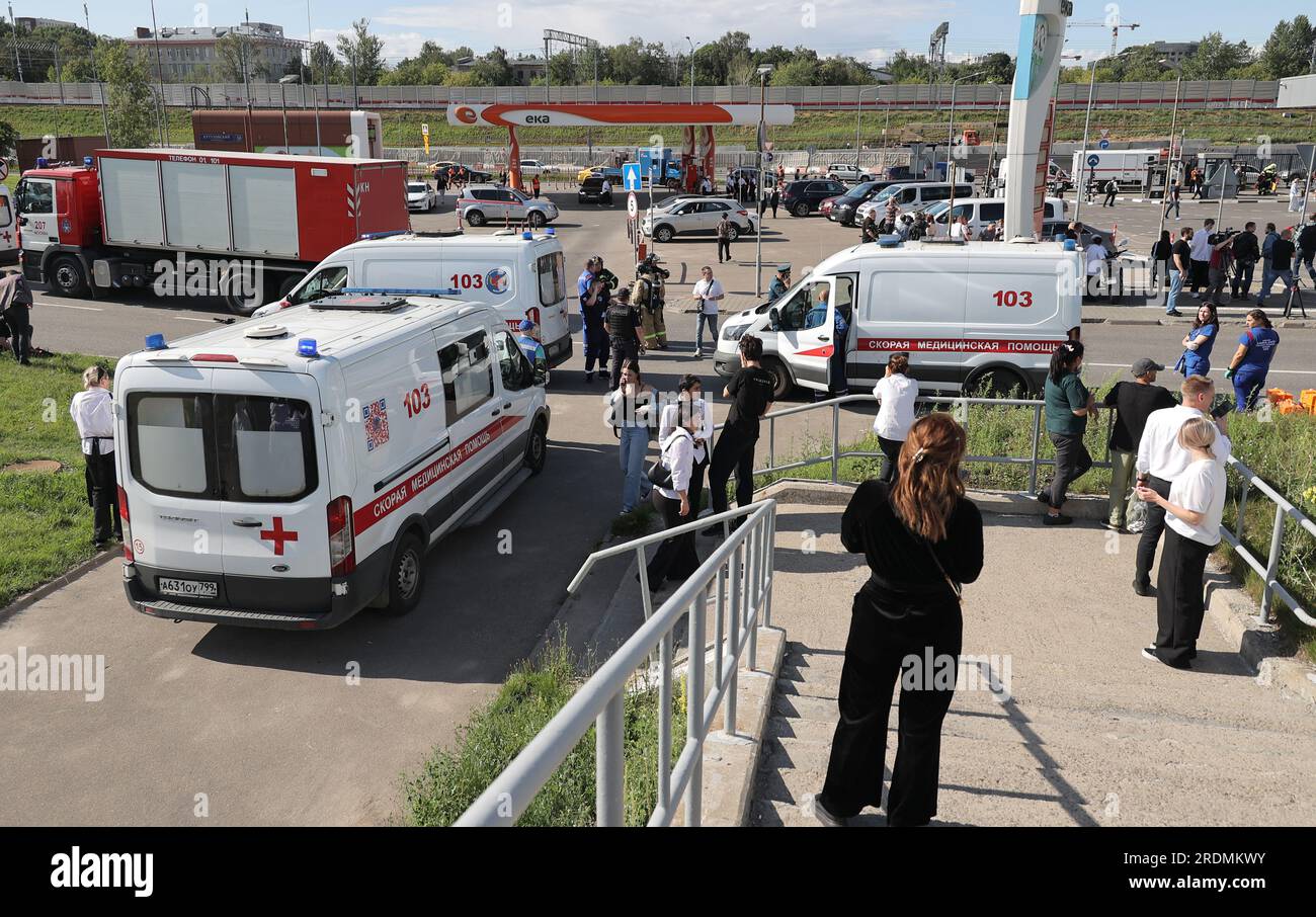 July 22 2023 Russia. Moscow. Employees of emergency services near the ...