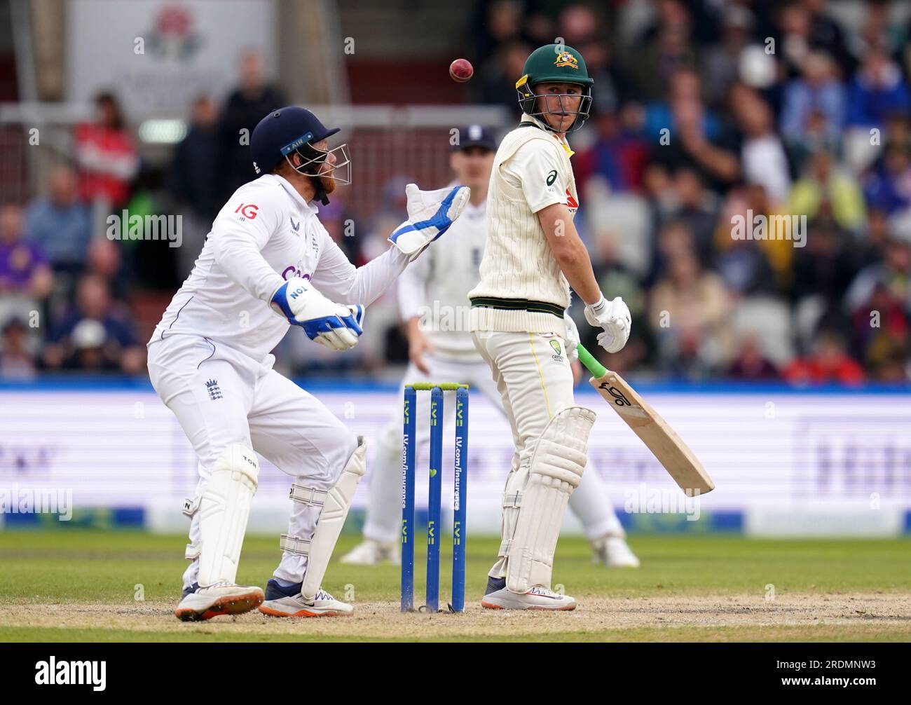 England's Jonny Bairstow (left) catches Australia's Marnus Labuschagne ...