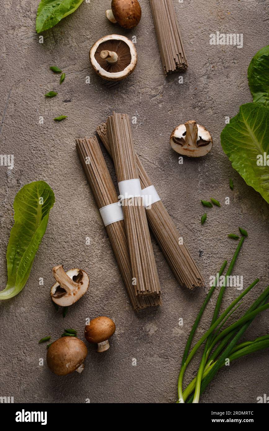 Raw soba noodles and cooking ingredient Stock Photo - Alamy
