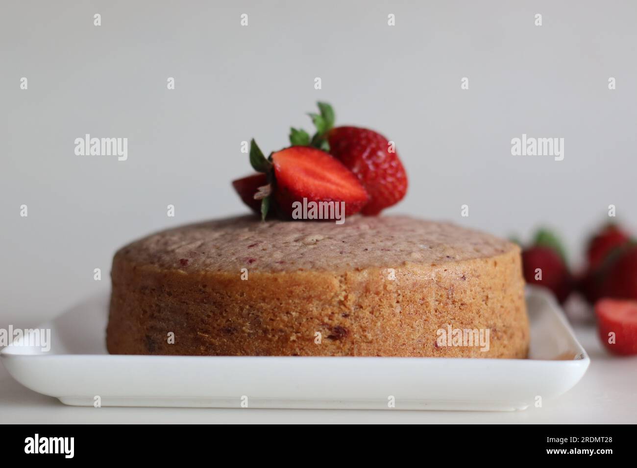 Strawberry cake. A simple tea time cake, flavored with fresh strawberry ...