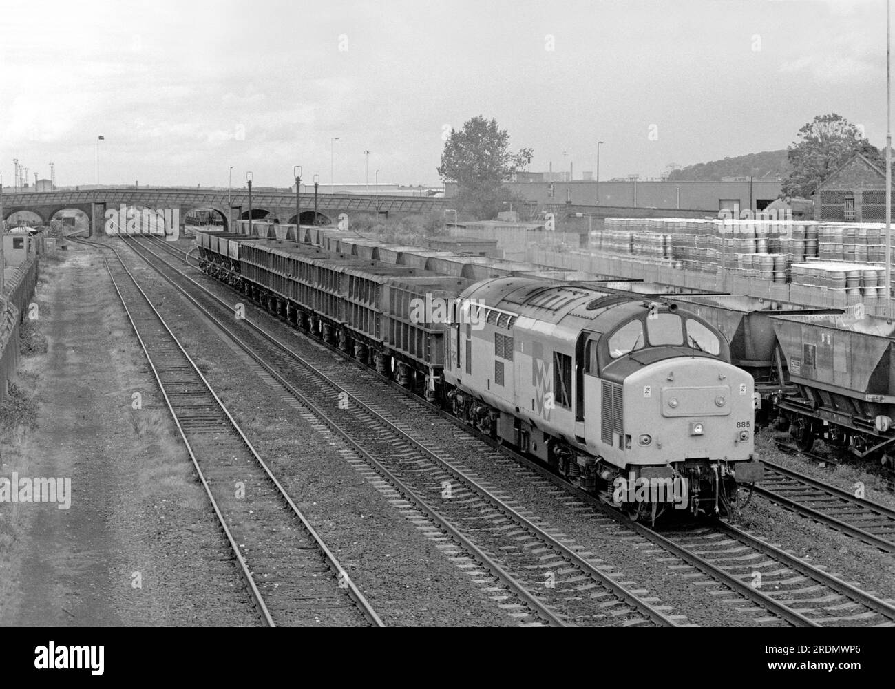 A Class 37 diesel locomotive number 37885 with a mixed rake of scrap ...
