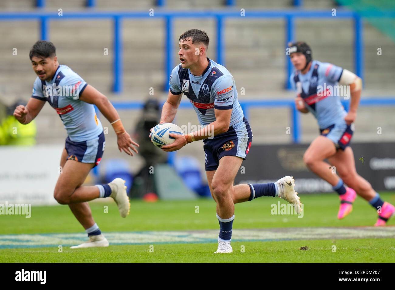 Lewis Dodd #7 of St. Helens makes a break during the Betfred Challenge ...