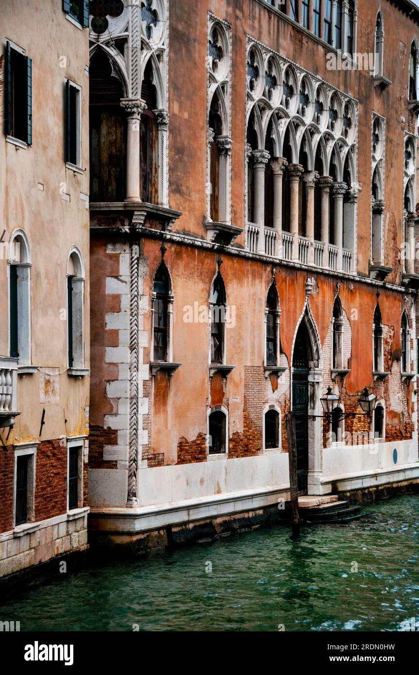 Water portal and angular mullioned windows on the facade of Venetian ...