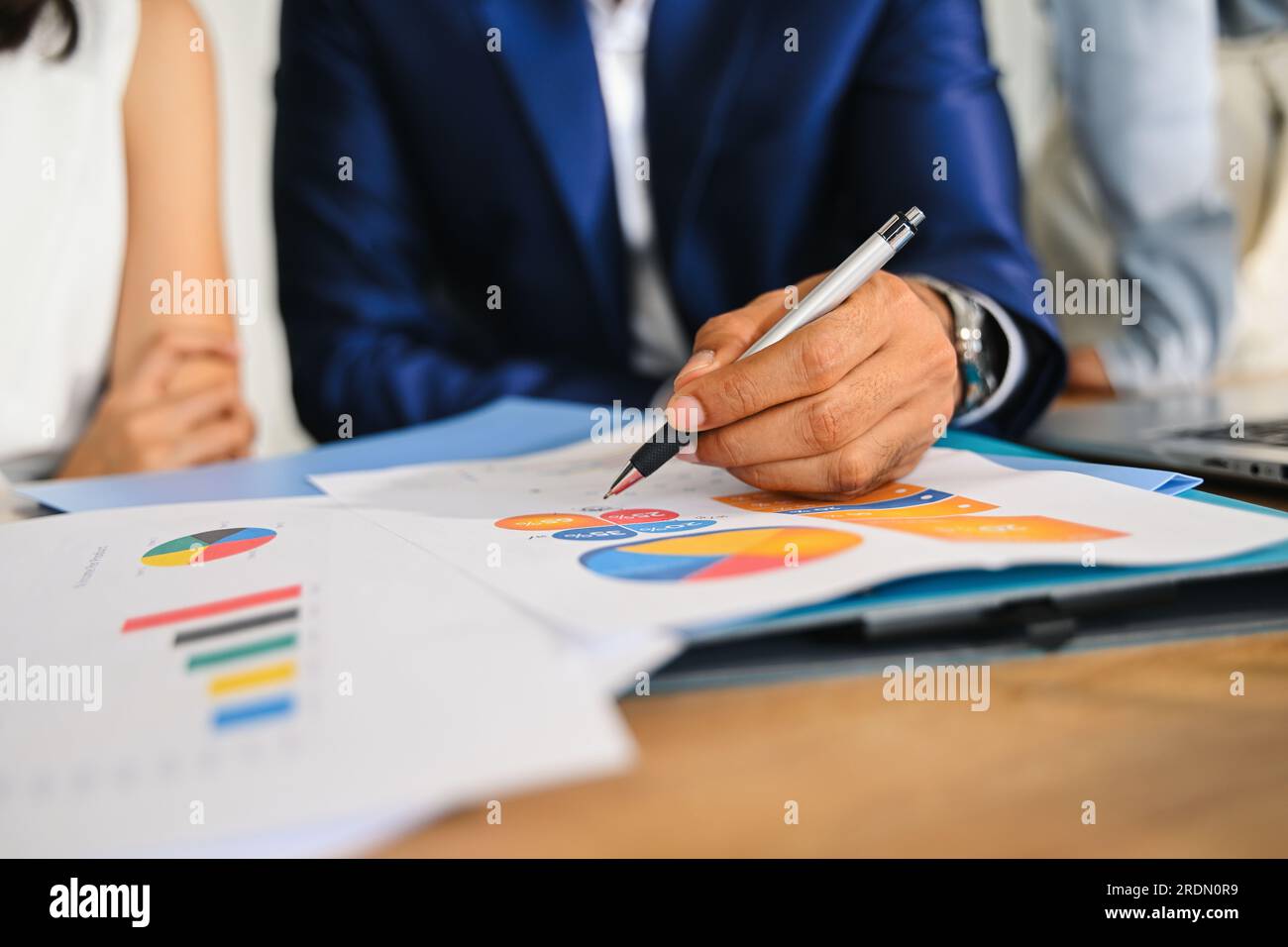 financial statistics at office meeting room. finance data and graphs ...