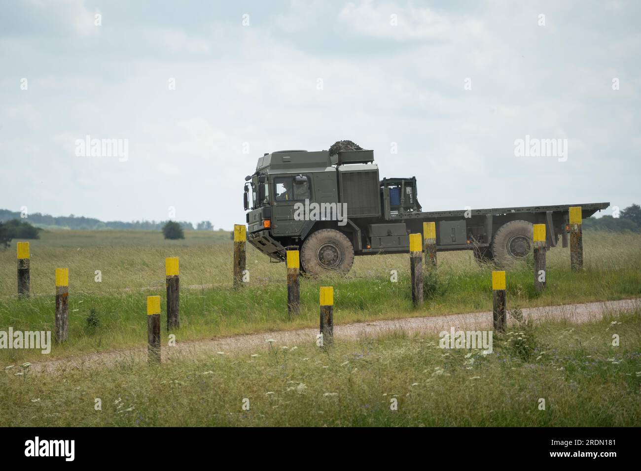 British army MAN 4x4 Flat Bed logistics truck in action Stock Photo - Alamy
