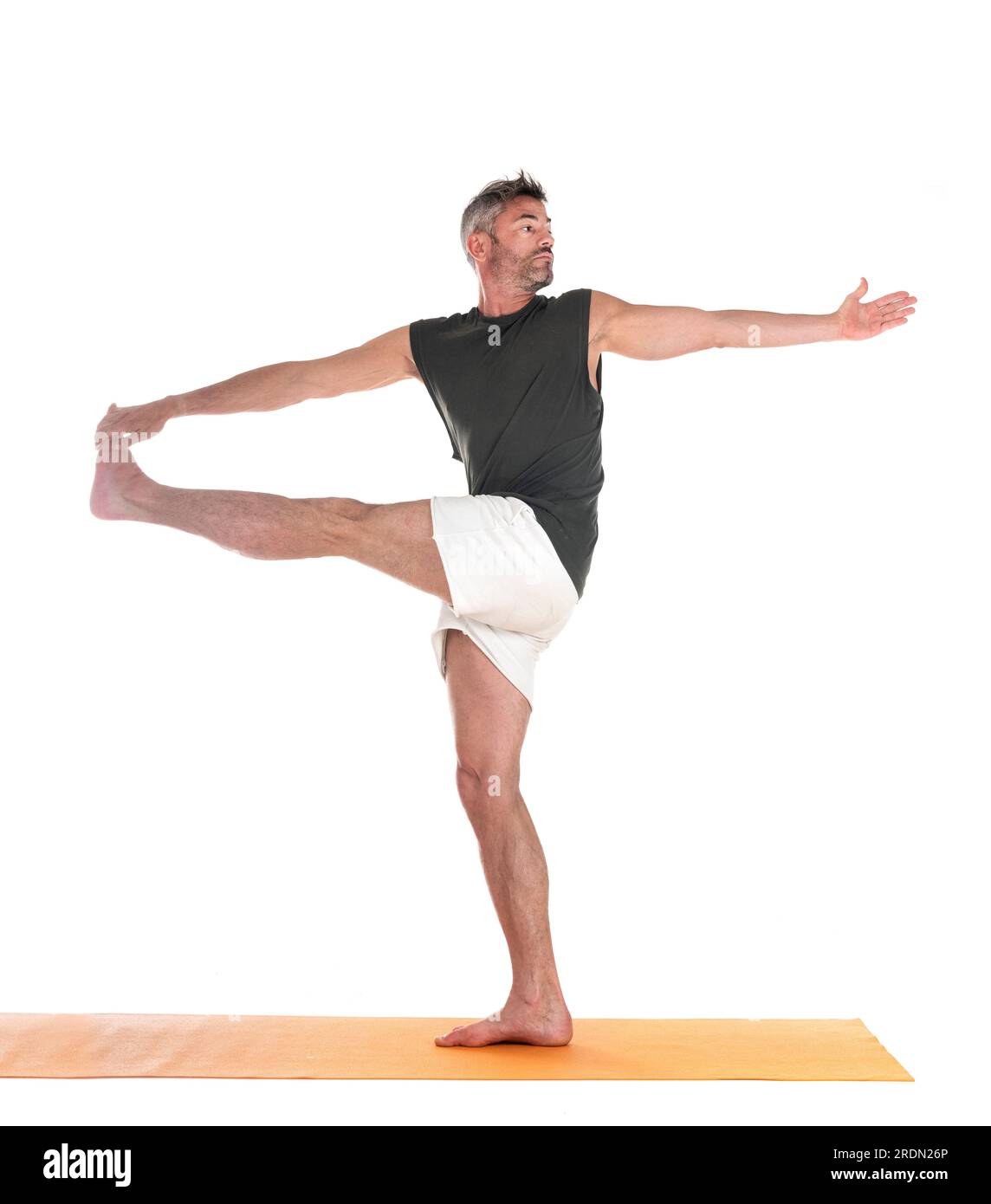 man and hatha yoga asana in front of white background Stock Photo - Alamy