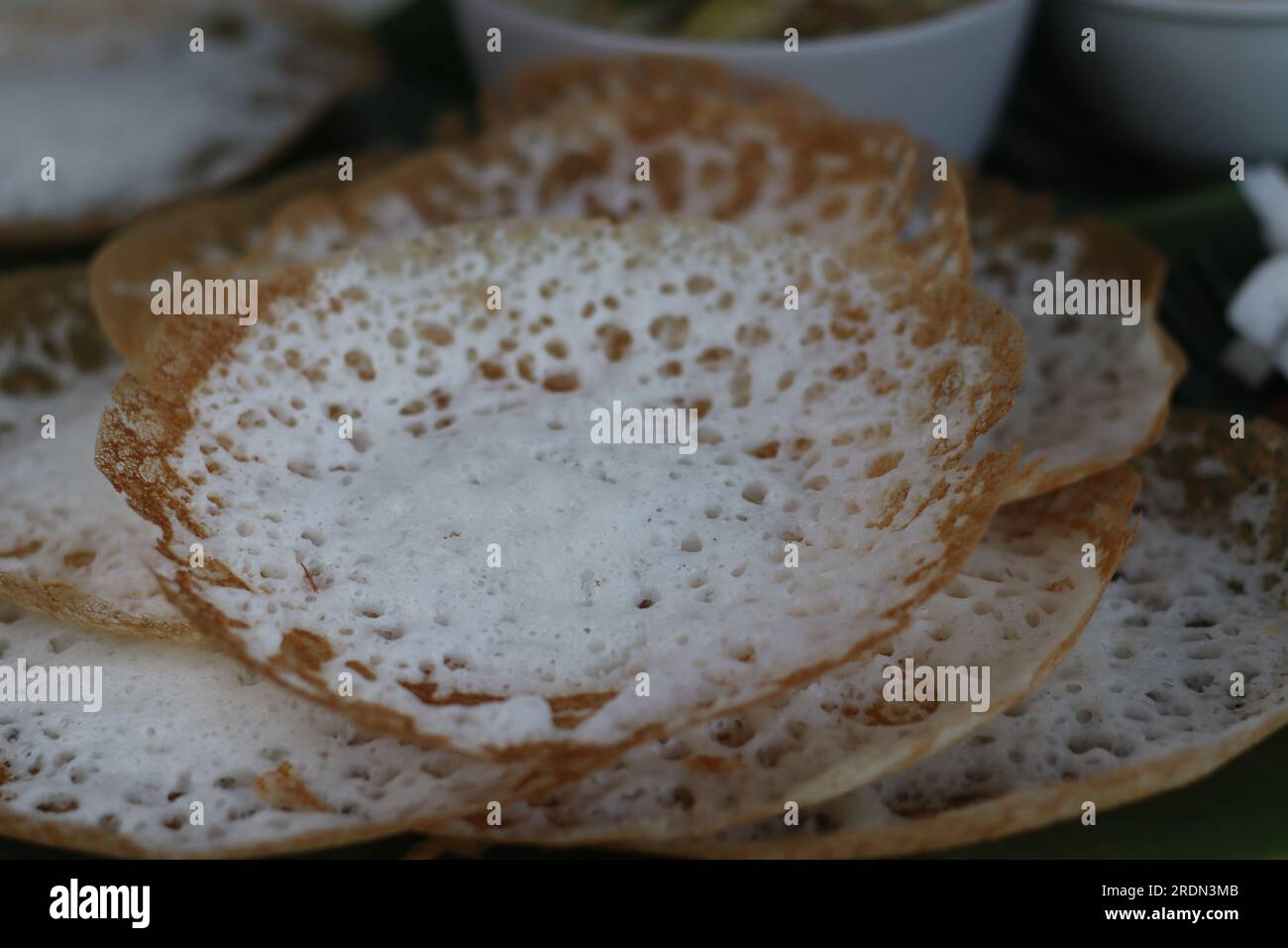 Laced Rice Crepes served with kerala style chicken stew. Fermented rice ...