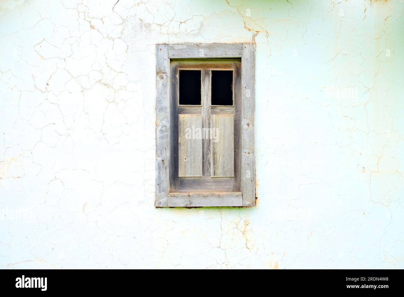 White wall and a simple timber window frame Stock Photo - Alamy