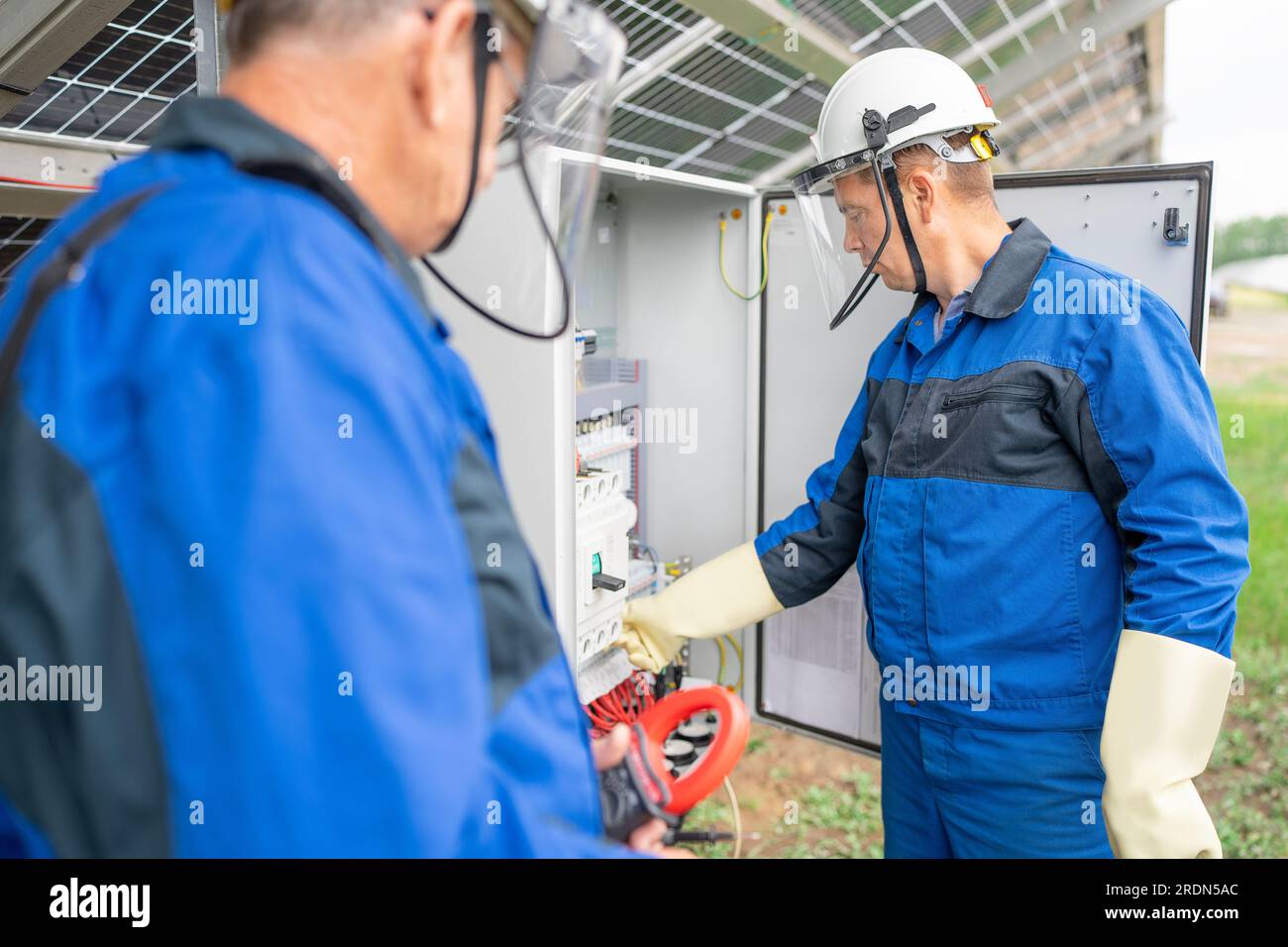 Electrical engineers working solar power hi-res stock photography and ...