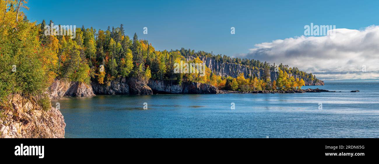 As clouds build over Lake Superior, the fall colors of the Minnesota ...
