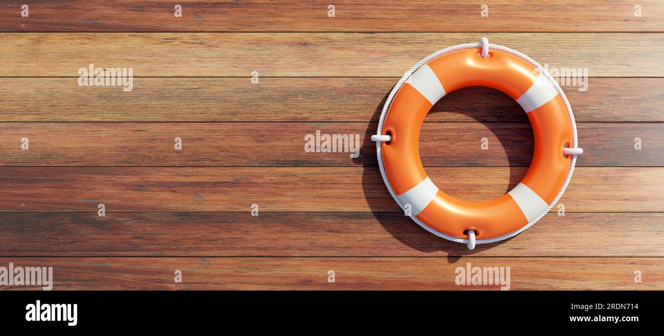 Lifebuoy on wooden background. Orange color life buoy ring, ocean and swimming safety equipment ...