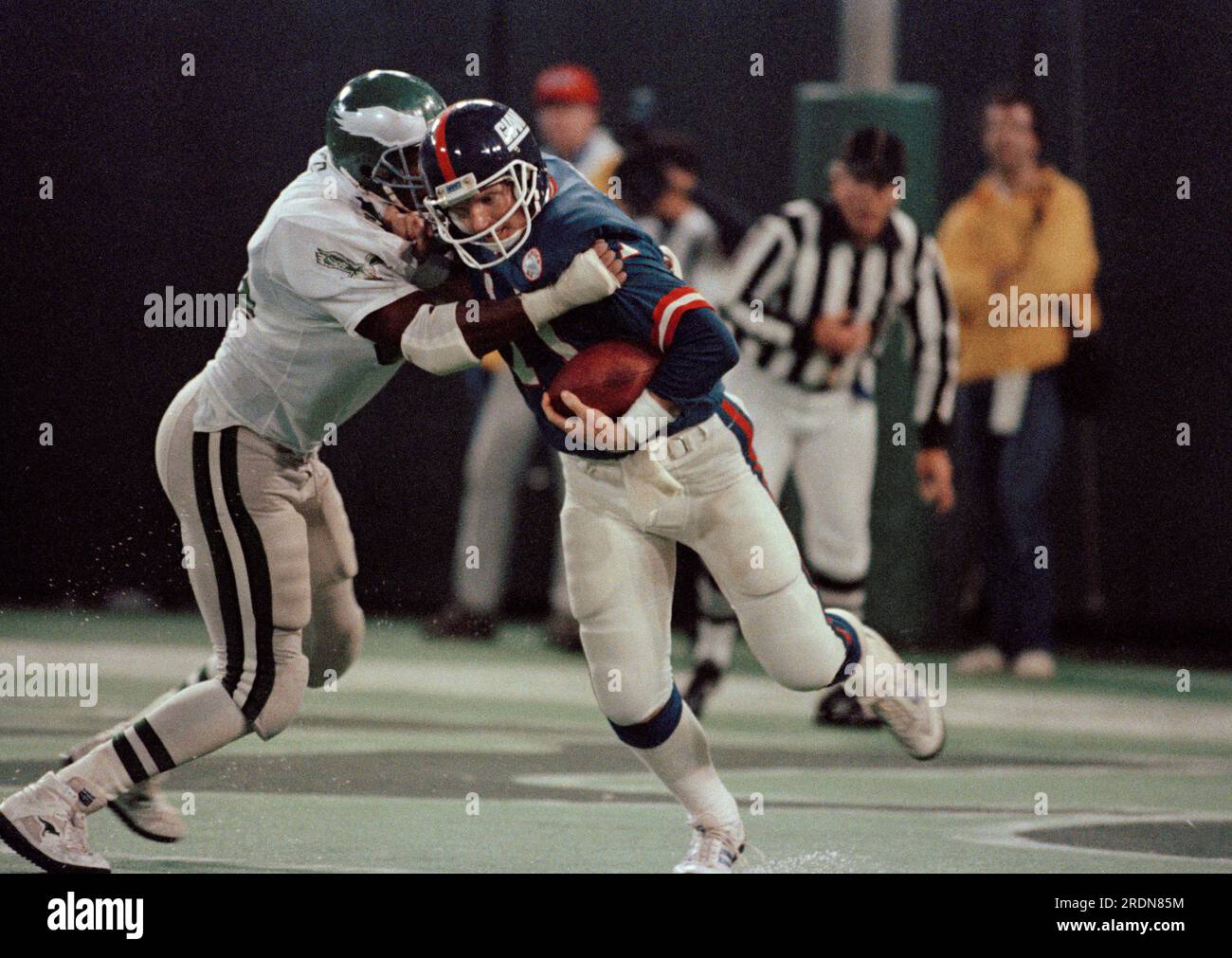 Philadelphia Eagles' Dwayne Jiles, left, brings down New York Giants ...