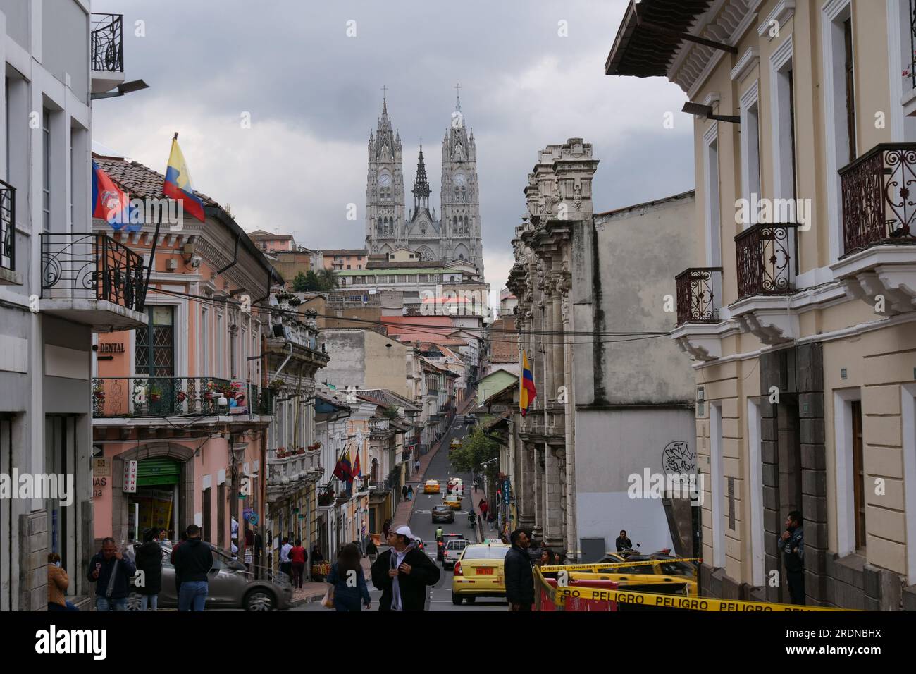 Quito city street view with the La Basílica del Voto Nacional in the ...