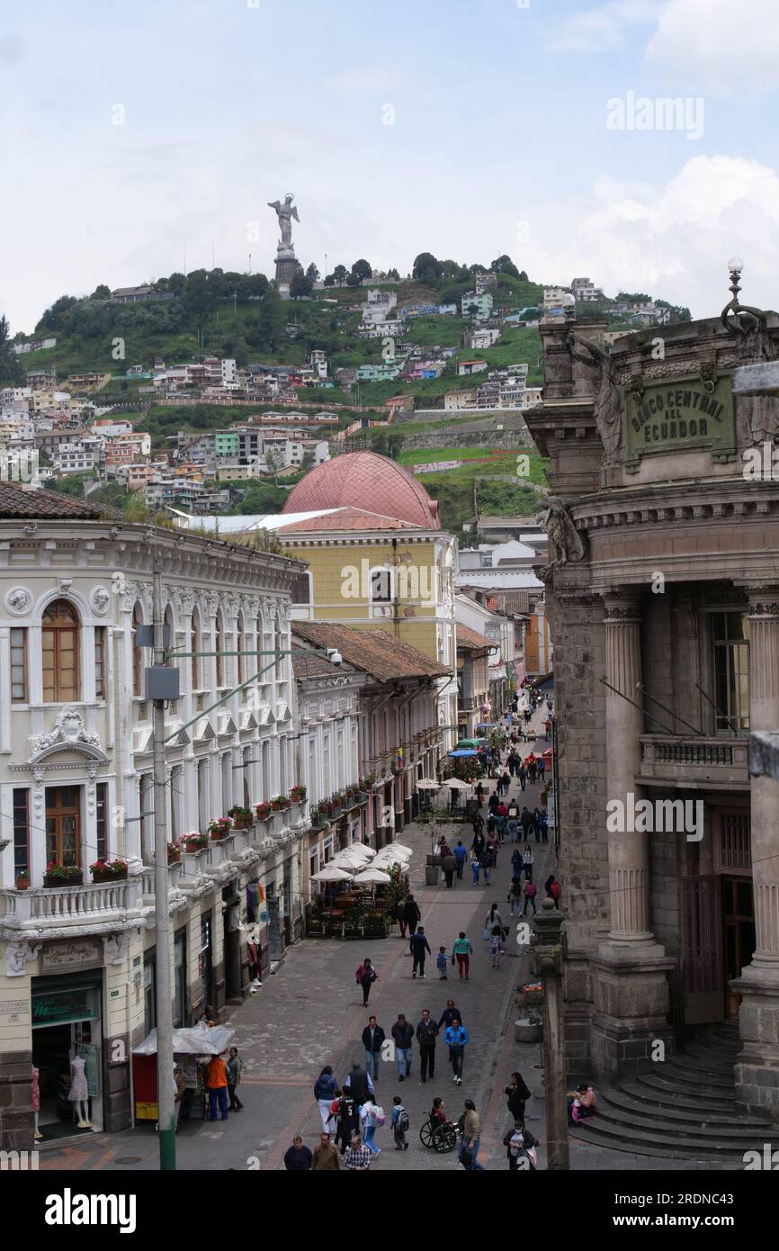 Quito city street view with the Virgin of the Panecillo (Virgen del ...