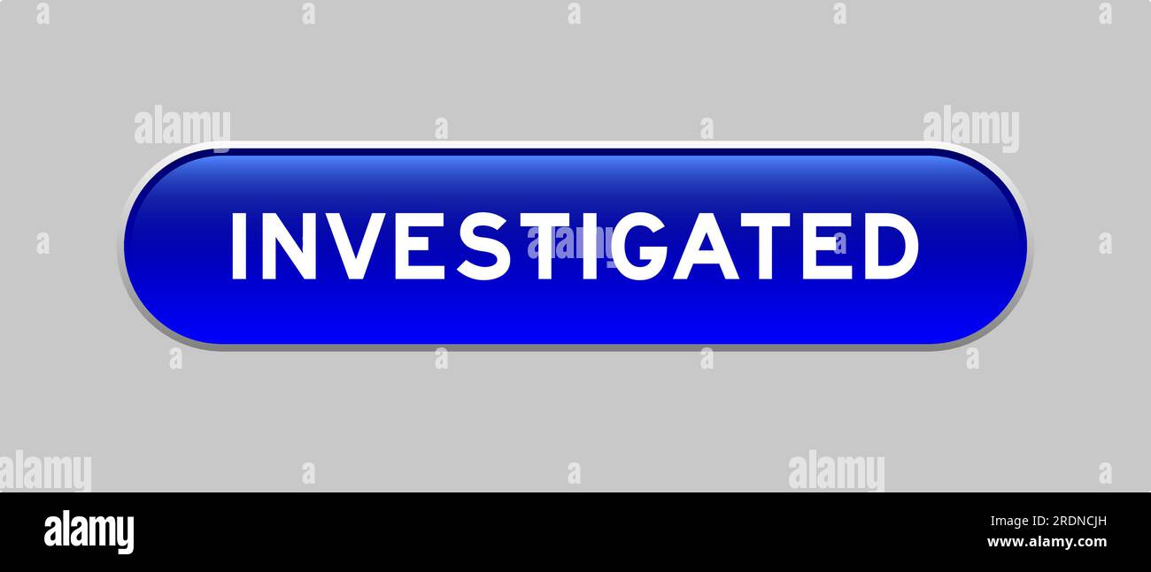 Blue color capsule shape button with word investigated on gray ...