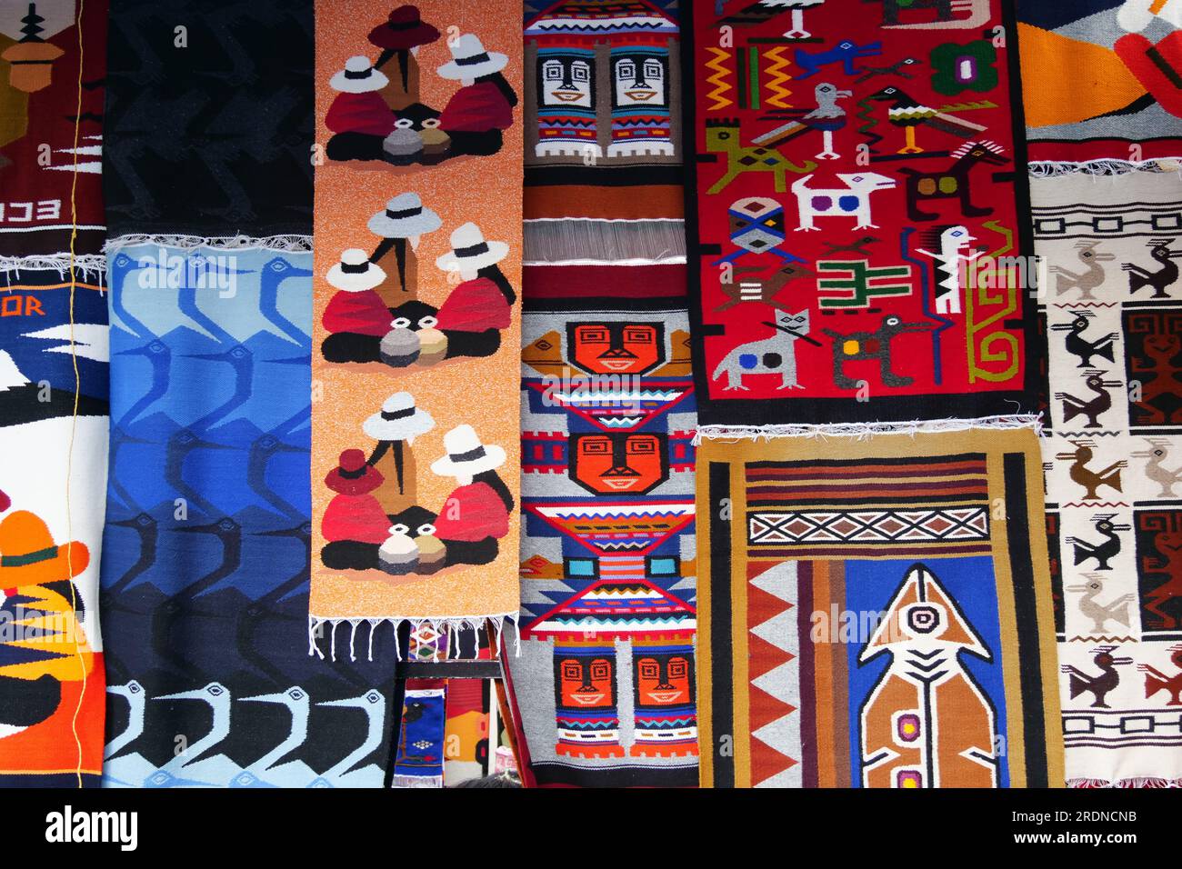 Colorful traditional woven carpets for sale at Otavalo market in ...