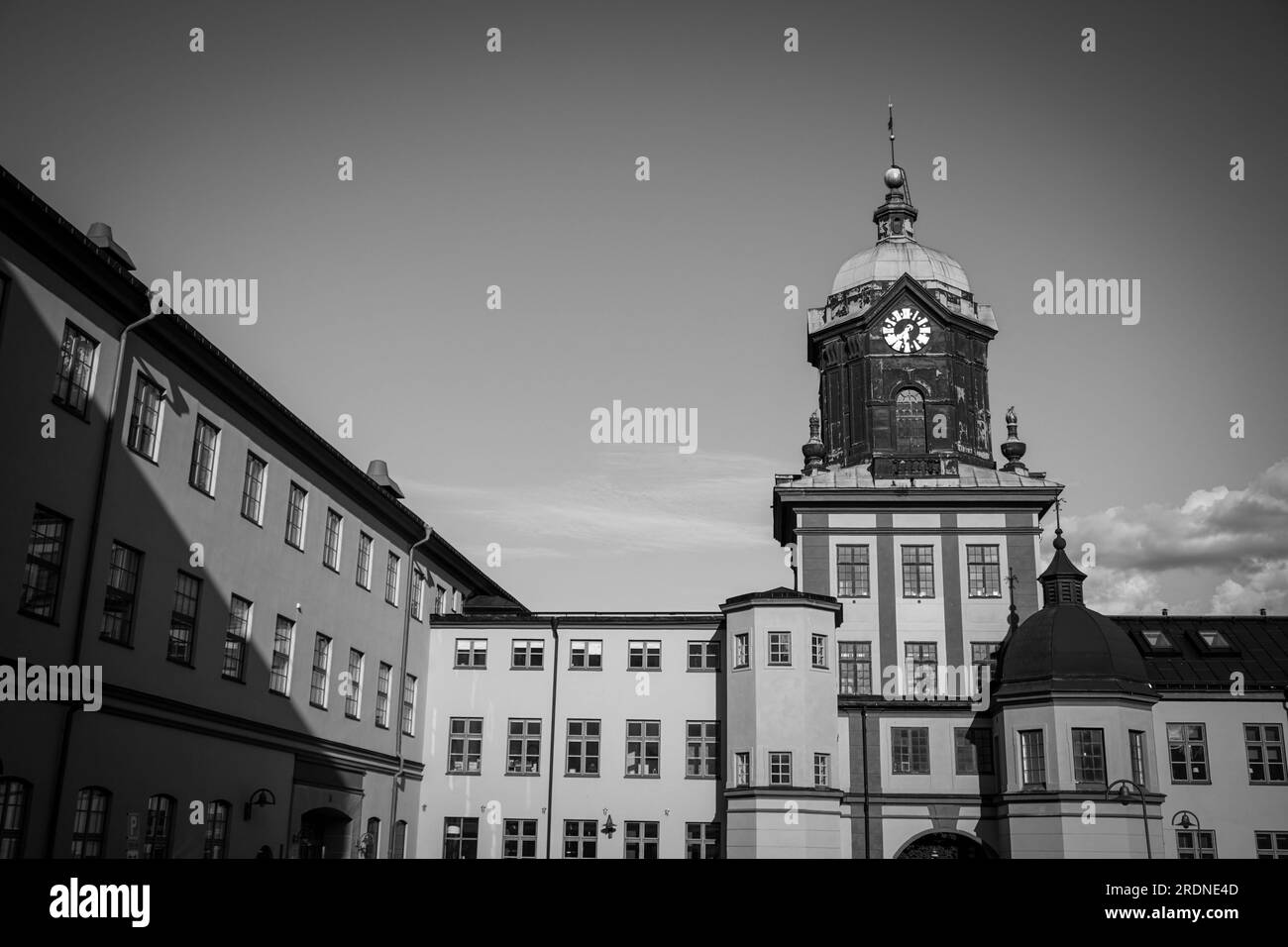 a clock tower on top of a building Stock Photo - Alamy