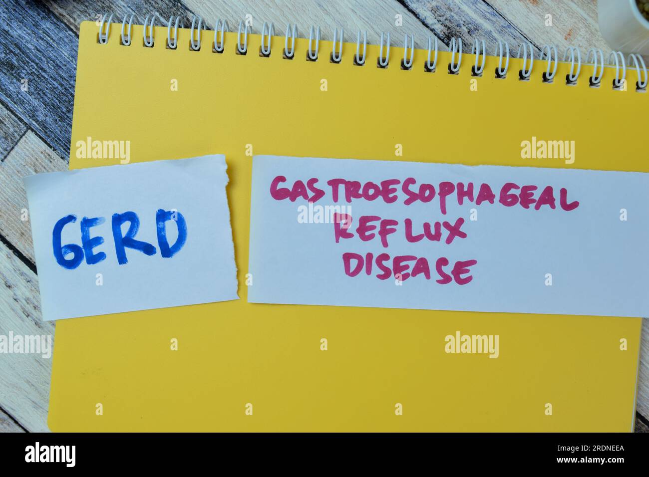 Concept of GERD - Gastroesophageal Reflux Disease write on sticky notes ...