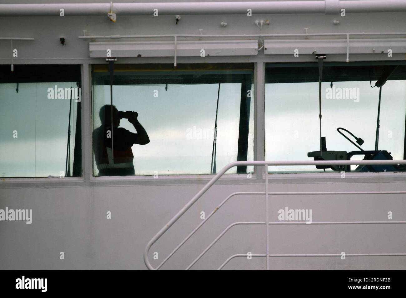 WELLINGTON, NEW ZEALAND, MAY 19, 2023:An officer on the bridge of the ...