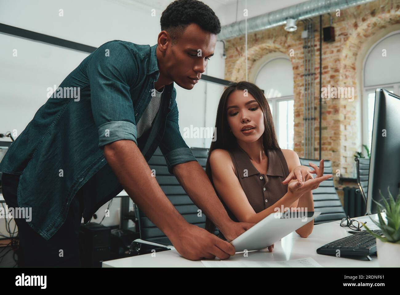 Here's what you have to do. Young beautiful woman explaining something ...