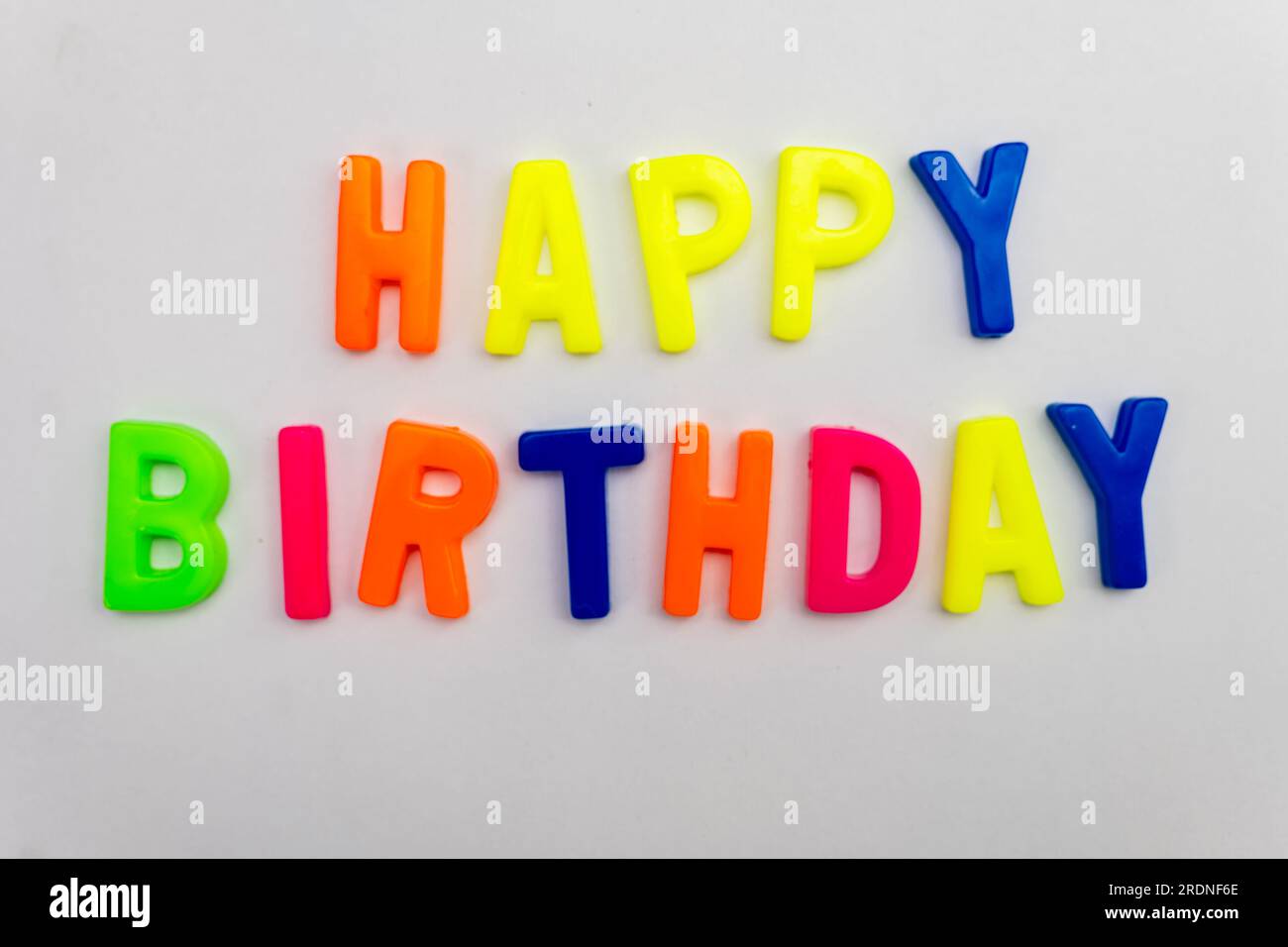 This stock image features the words "Happy Birthday" made from colorful ...