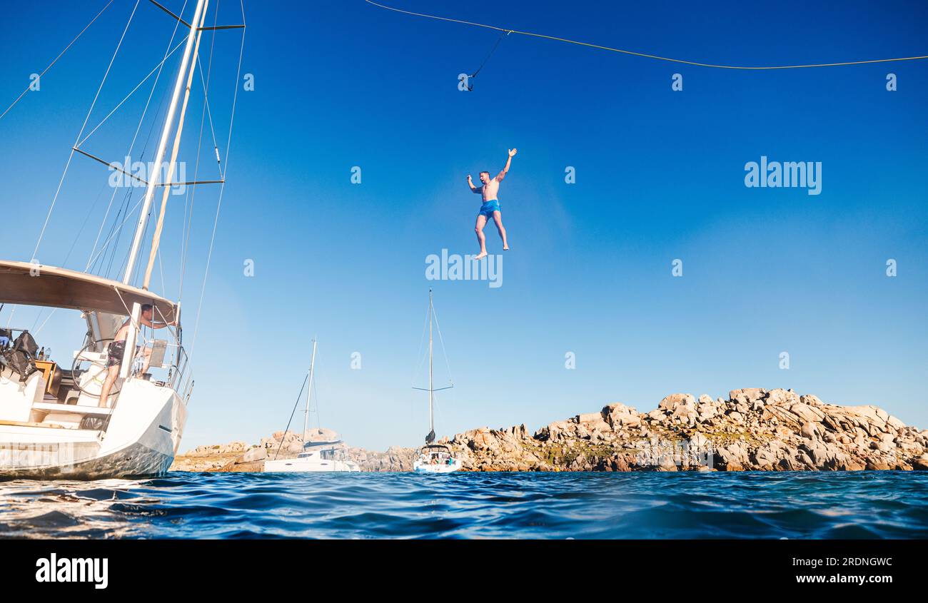 Man jump sea from boat hi-res stock photography and images - Alamy