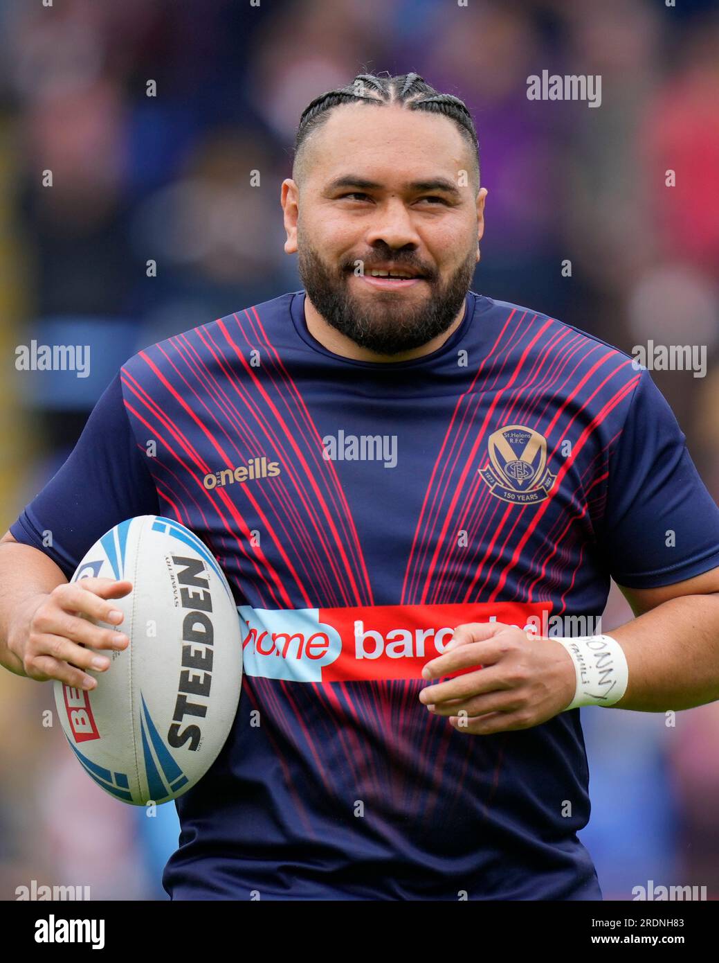 Konrad Hurrell #23 of St Helens warms up before the Betfred Challenge ...