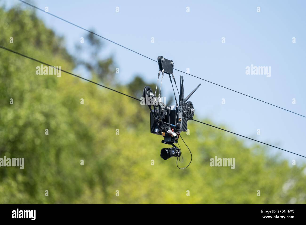 Remote controlled camera on a wire Stock Photo - Alamy