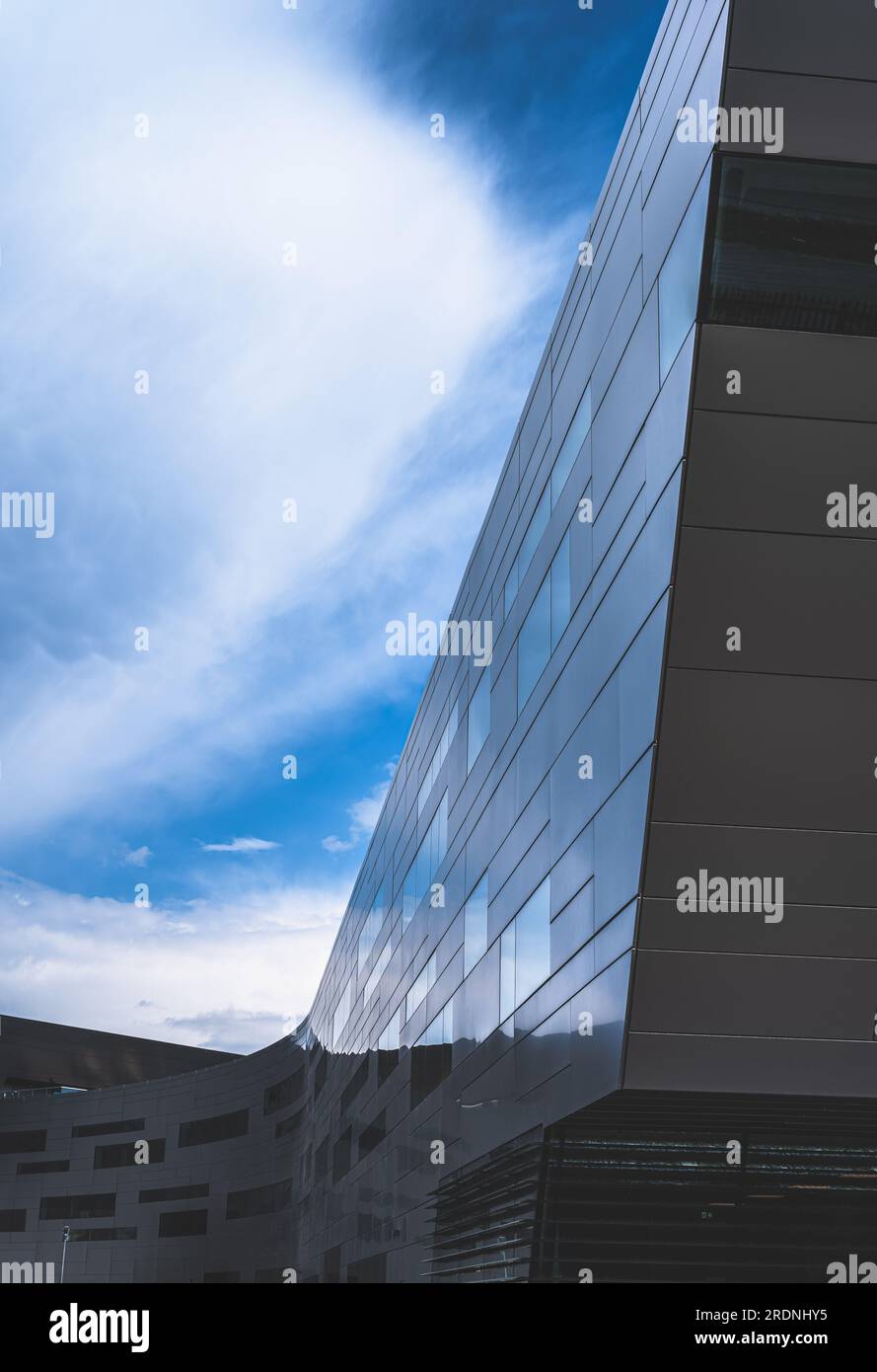 Large dark office building with odd angles Stock Photo - Alamy