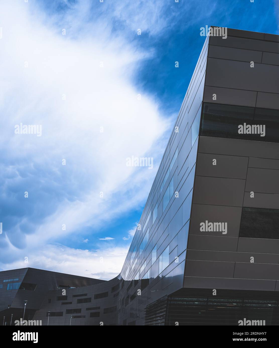 Large dark office building with odd angles Stock Photo - Alamy