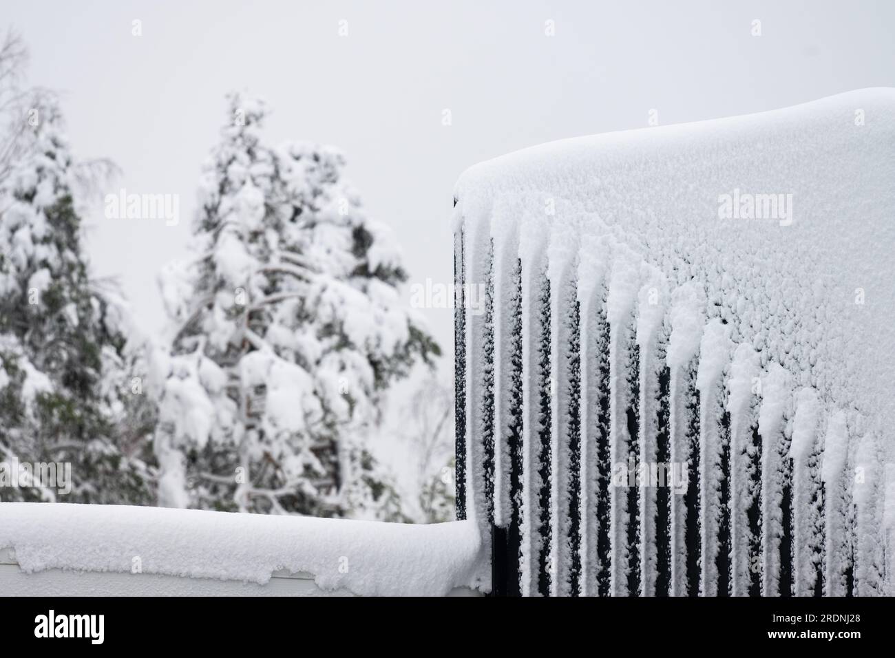 Facade of a building covered in snow Stock Photo - Alamy