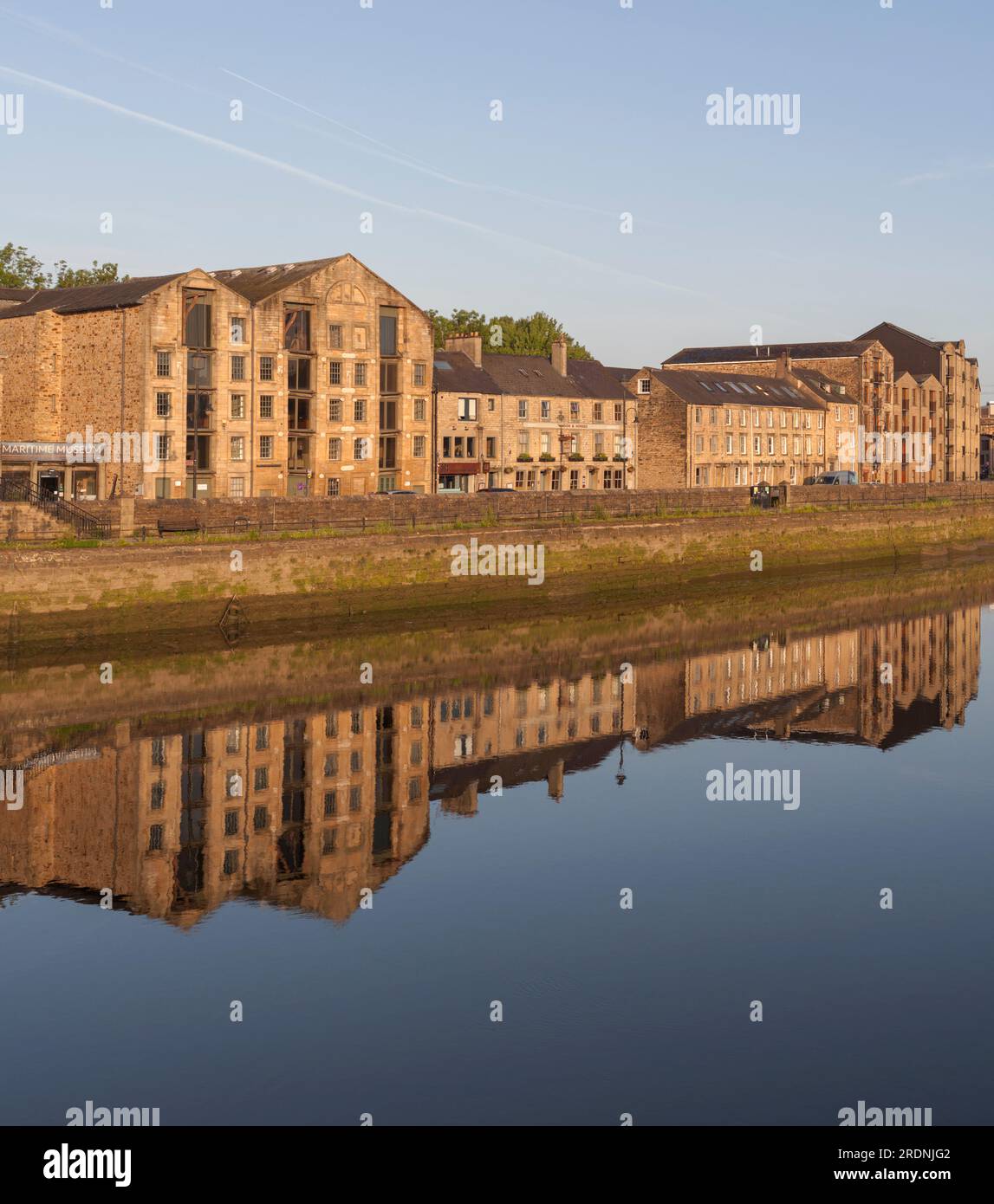 Saint Georges Quay (Lancaster, river Lune) on a still morning with the ...