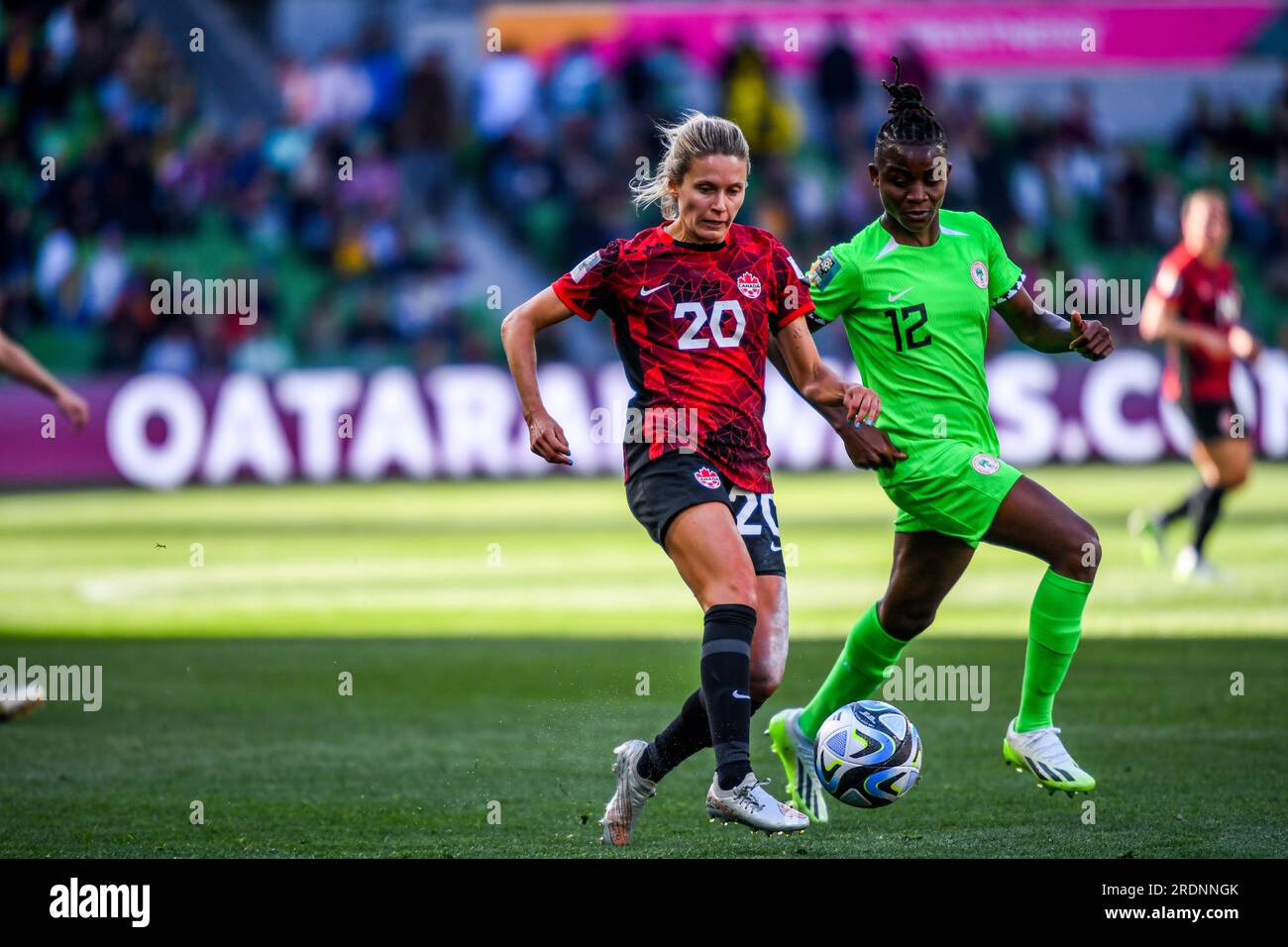 Cloé Lacasse (No.20) (L) of Canada and Uchenna Kanu (No.12) (R) of ...