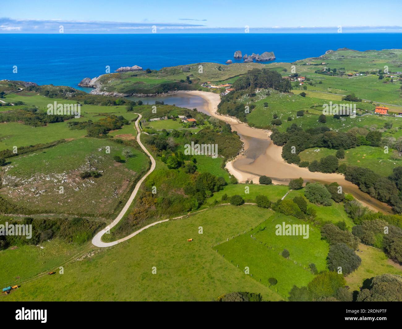 Aerial view on Playa de Poo during low tide near Llanes, Green coast of ...