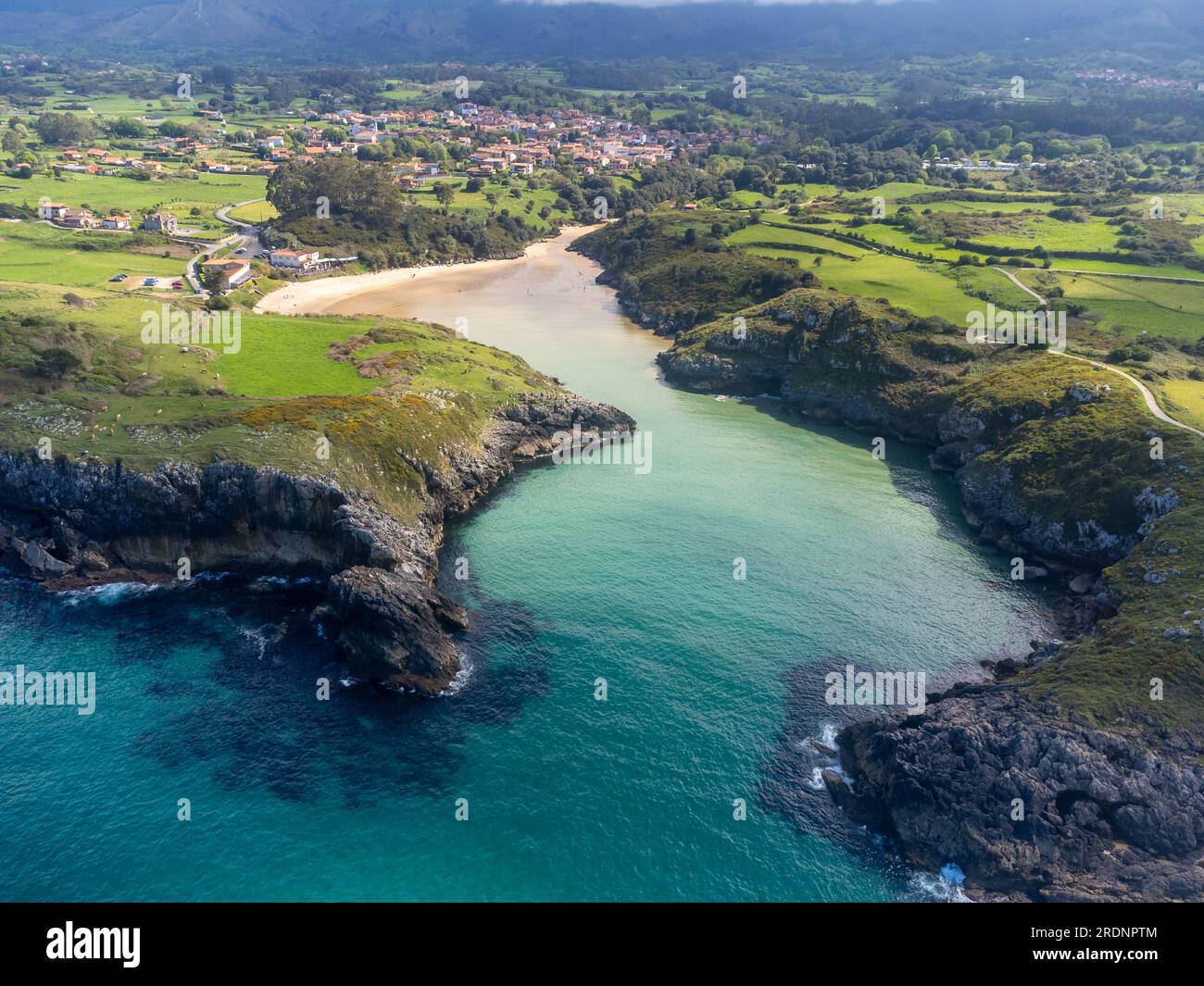 Aerial view on Playa de Poo during low tide near Llanes, Green coast of ...