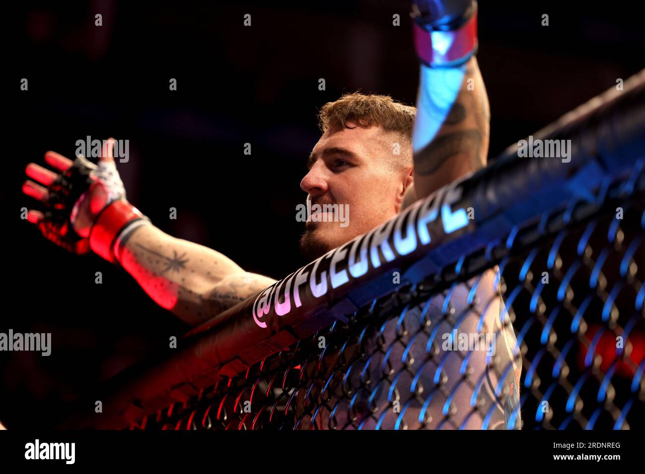 Tom Aspinall celebrates after winning his heavyweight bout against ...