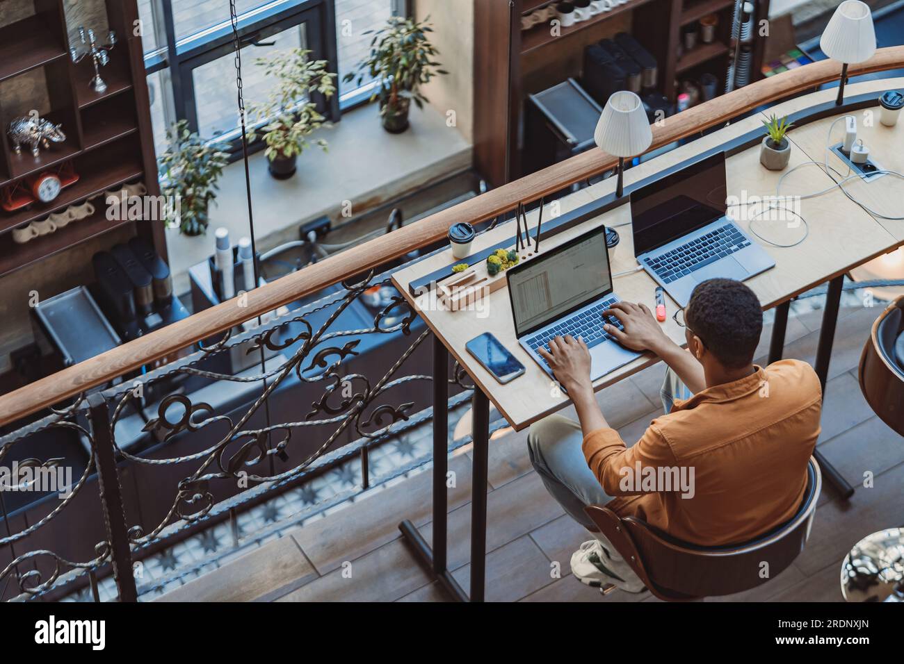 Back view of a man on computer hi-res stock photography and images - Alamy