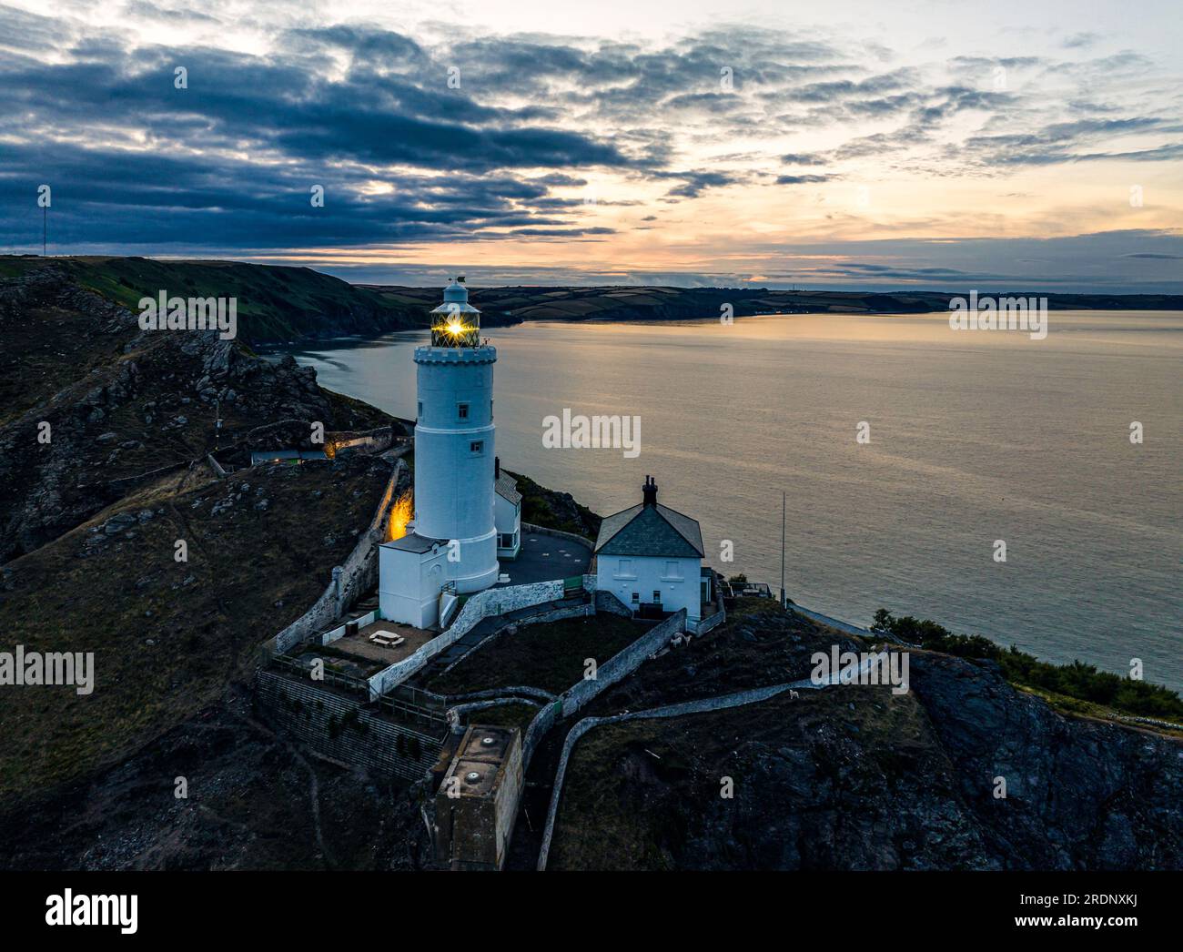Sunset over Start Point Lighthouse from a drone, Trinity House and ...
