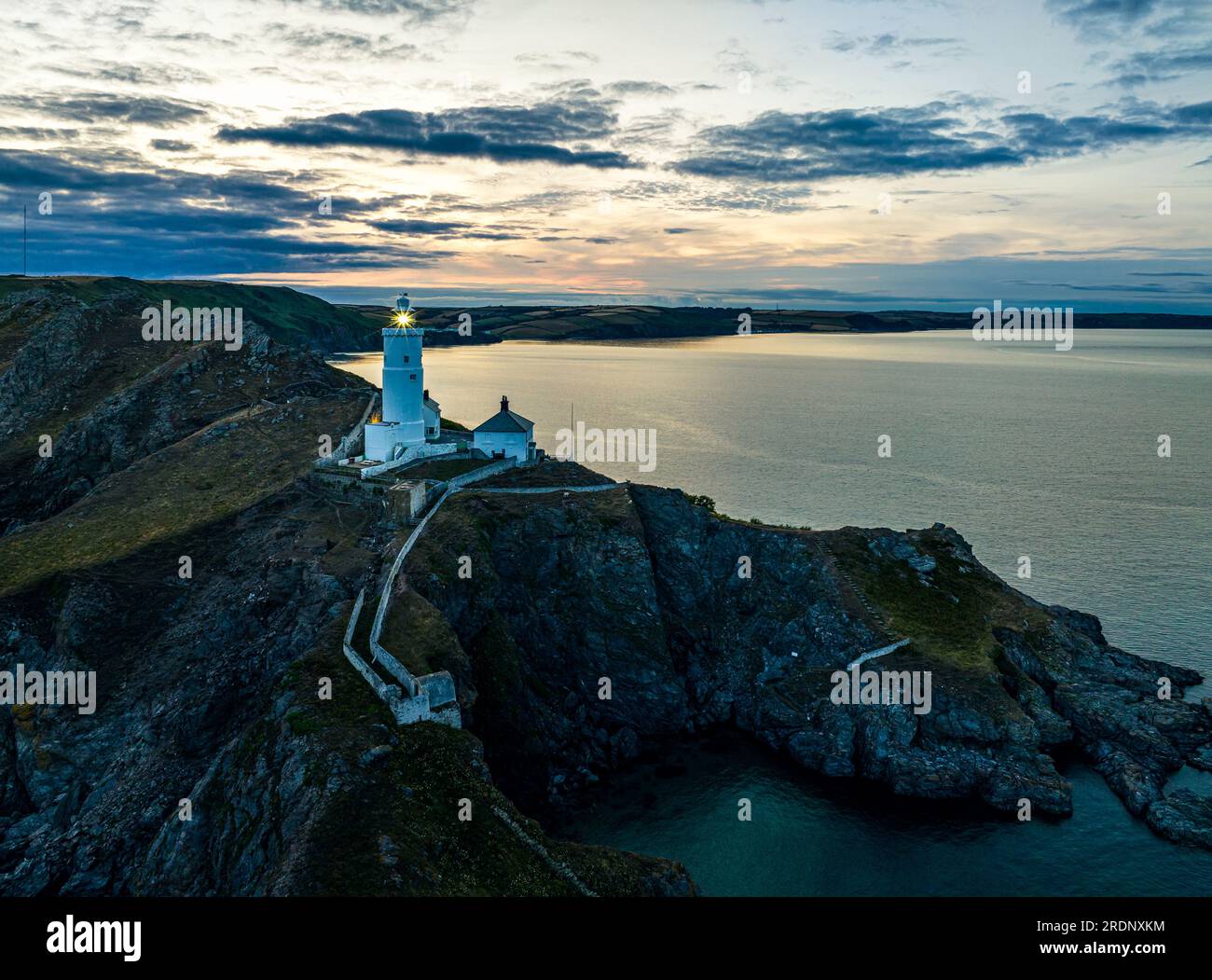 Sunset over Start Point Lighthouse from a drone, Trinity House and ...