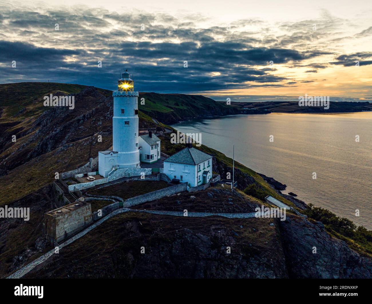 Sunset over Start Point Lighthouse from a drone, Trinity House and ...