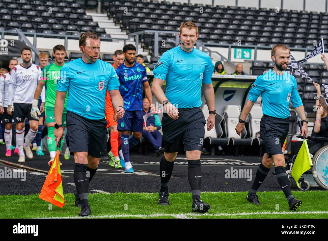 Derby, UK. 22nd July, 2023. Referee James Oldham, Assistant Referees ...
