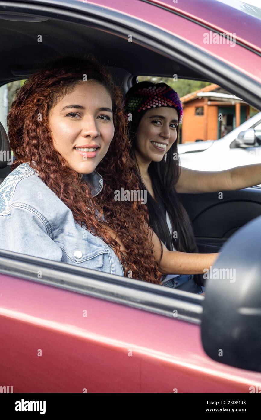 traveling in a car, lifestyle and transportation, portrait of two young ...
