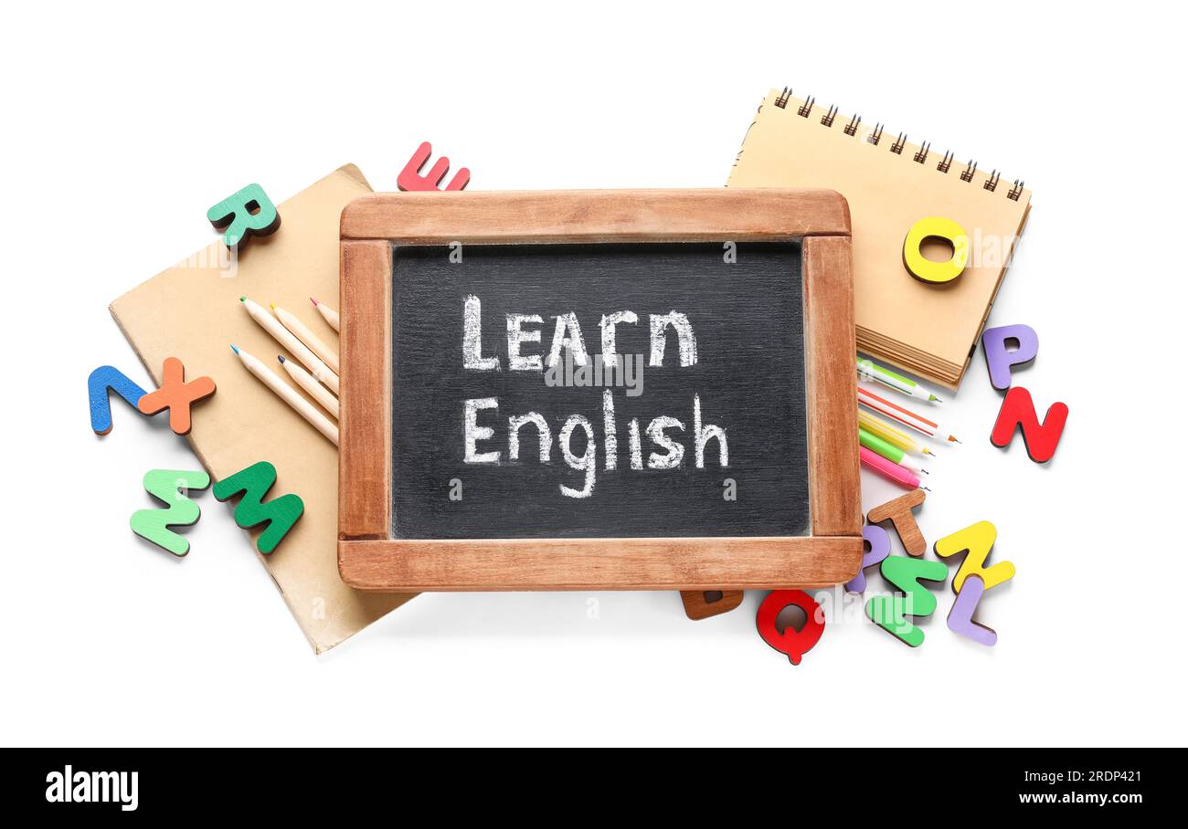 Stationery, letters and blackboard with text LEARN ENGLISH isolated on ...