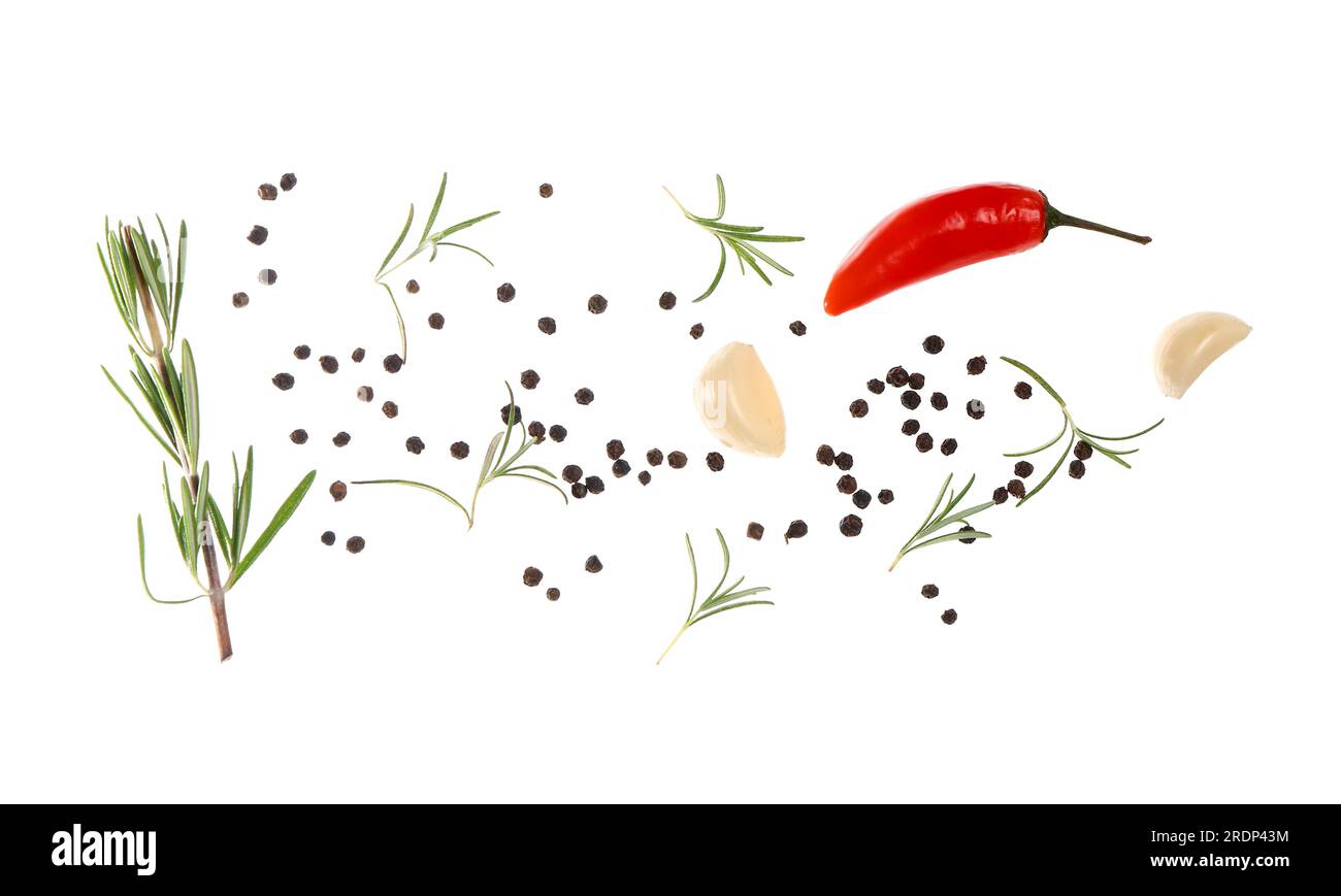 Flying fresh spices on white background Stock Photo - Alamy