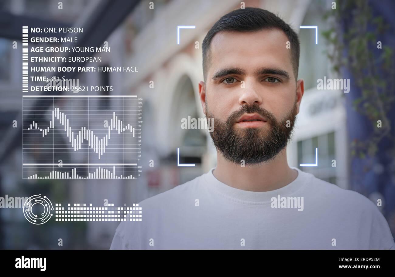 Facial recognition system. Man with scanner frame and personal data ...