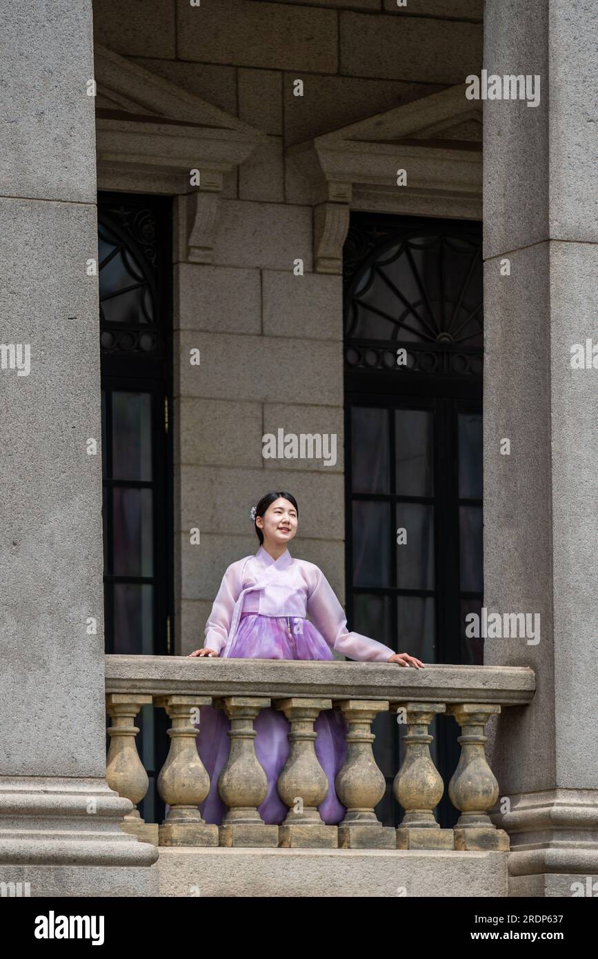 Pretty Korean girl wearing traditional Hanbok dress in Seoul South ...